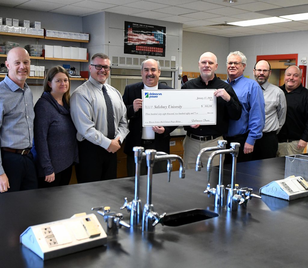 SU Receives Check from Delmarva Power - SBJ